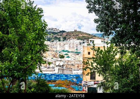 The streets of the old town of Fez, which are locals and children ...