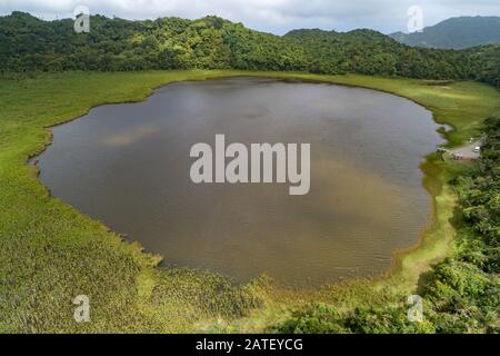 The Caribbean, Grenada: aerial view of the volcanic Island of Carriacou ...