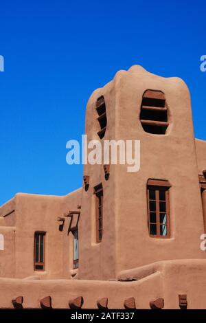 Building of pueblo revival style architecture of the Southwest with ...