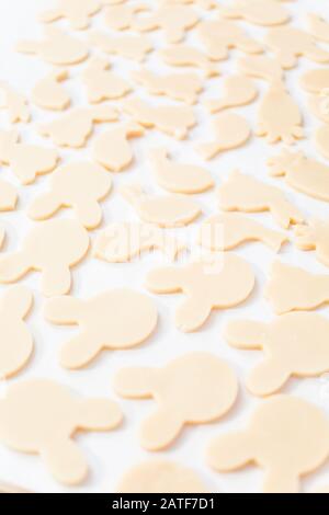 Unbaked Easter sugar cookies on a white table Stock Photo - Alamy
