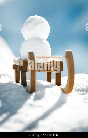 Snow winter sledge standing by wooden cottage Stock Photo - Alamy