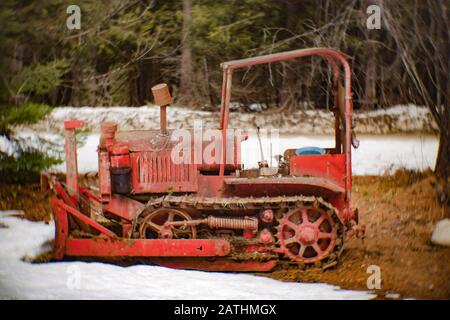 An old, red 1932 International McCormick-Deering T20 Bulldozer Crawler ...