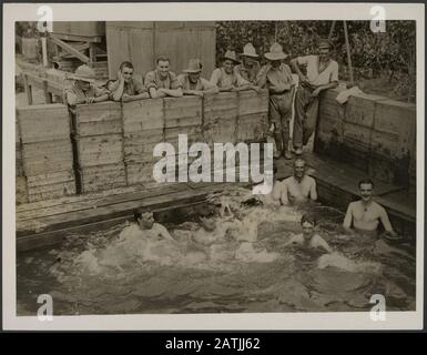 A field shower bath setup for soldiers in World War I, captured on ...