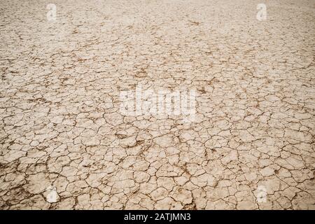 Dried out desert area and background sand structure Stock Photo - Alamy