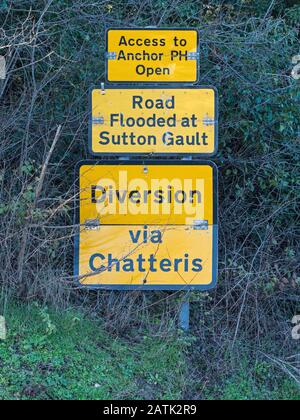 Warning sign with Sutton Gault flooded message in Sutton ...