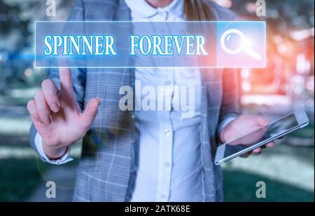 Handwriting text Spinner Forever. Conceptual photo stress reliever for ...