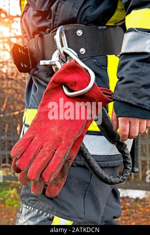 Close up hand Fireman,Firefighter holding the fire extinguisher Stock ...
