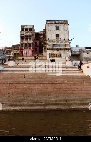 view of popular Assi Ghat with several pilgrims, that stands at the ...