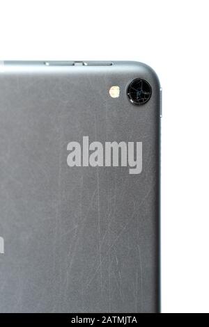 Scratched back side of tablet isolated on white background Stock Photo ...