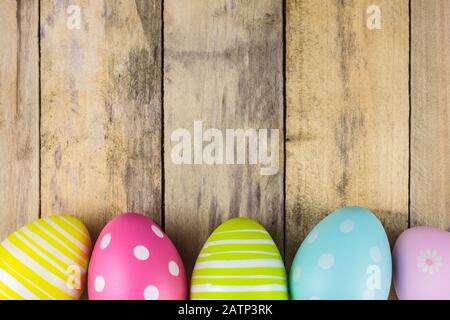 Colorful Easter eggs background wooden, eastereggs, festive Stock Photo ...