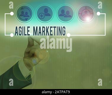 Writing note showing Agile Marketing. Business concept for focusing ...