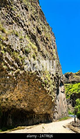 Scenic view of basalt column formation by Litlanesfoss waterfall in ...