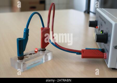 Electrical experiment in physics laboratory. Electrical circuit with ...
