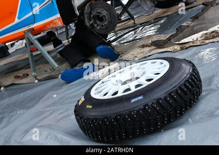 A detail of the tyre with studs used for the rally cars to have a ...