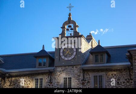 The historic Old Saint-Sulpice Seminary in Montreal, Quebec, featuring ...