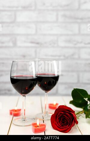 A selective of wine glasses on a wooden table Stock Photo - Alamy