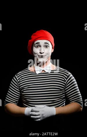 Portrait of mime artist in beret on grey background Stock Photo - Alamy