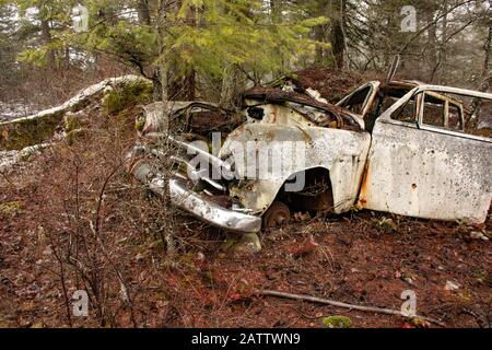 wrecked 1960s Chrysler station wagon in junkyard Stock Photo - Alamy