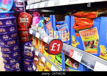 Packets of sweets in a UK supermarket Stock Photo - Alamy