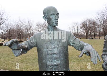 Wright Brothers Statue shows Wilbur explaining "wing warping" to ...