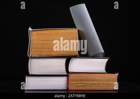 A pile of very thick and voluminous books. Enormous amount of knowledge ...