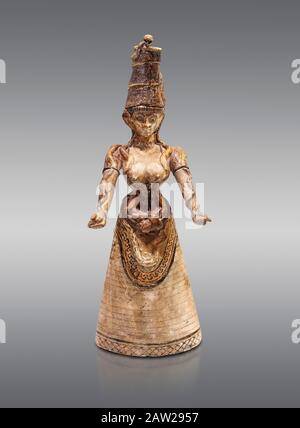 Minoan Snake Goddess statue with snakes entwined around her from the ...