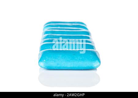 Lot of whole blue chewing gum in bamboo bowl isolated on white ...