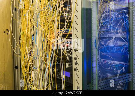 Tangled wires in server room at television station Stock Photo - Alamy