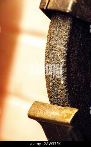 A bench grinding machine used to sharper tools, grind down metal and ...