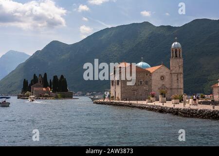 The twin islets of Gospa od Škrpjela (Our Lady of the Rocks) and Ostrvo ...