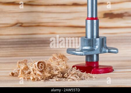 Flat drill bit make hole in drilling a hole in a wood plank Stock Photo ...