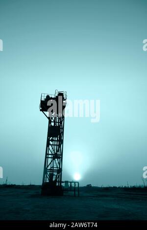 Tower type pumping unit in the evening Stock Photo - Alamy