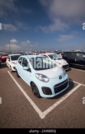Brand new cars imported and exported from port Stock Photo - Alamy