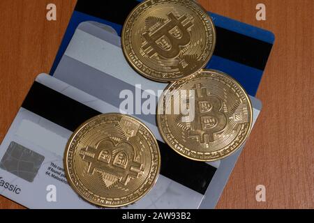 Payment card with Bitcoin, crypto currency credit gold card raster ...
