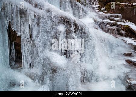 Amazing, close-up view of completely frozen waterfall, beautiful ...