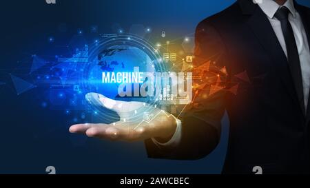 Elegant hand holding MACHINE inscription, digital technology concept ...