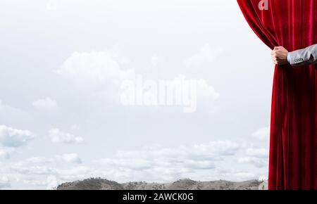 Summer natural bluesky view behind red velvet curtain Stock Photo - Alamy