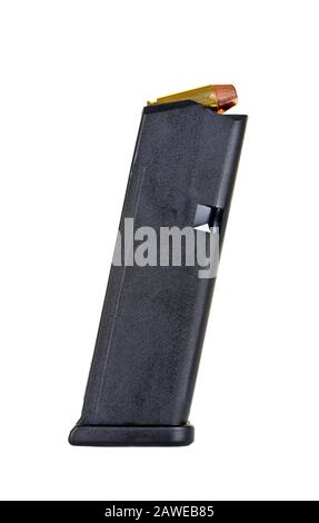 A handgun magazine loaded with .40 caliber hollow point bullets on top ...