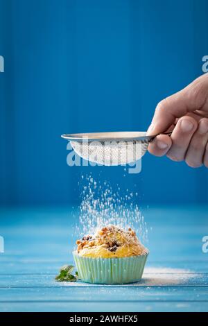 Mini cakes with nuts on wooden background Stock Photo - Alamy