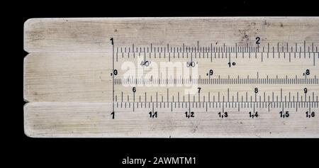 Old pocket slide rule mechanical calculator Stock Photo - Alamy