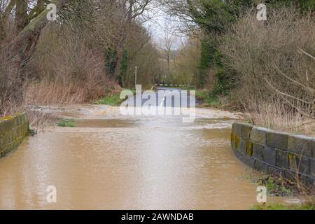 Flooding on Ledston Mill Lane in Ledston, West Yorkshire, after Storm ...