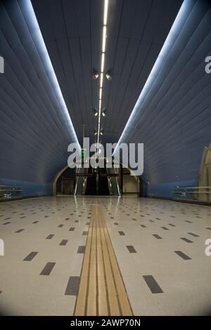 Blue subway train at the underground station Stock Photo - Alamy