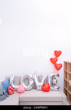 Interior of bedroom with gifts and balloons for Valentine's Day Stock ...