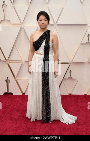 Siqi Song walking on the red carpet at the 92nd Annual Academy Awards ...