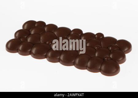 milk chocolate bar, chocolate popping (popcik) isolated on white ...