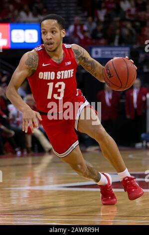 Ohio State guard CJ Walker (13) drives on Illinois guard Adam Miller ...