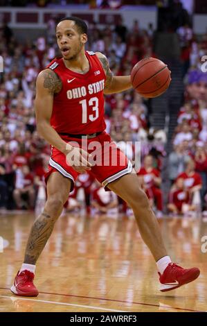 Ohio State guard CJ Walker (13) drives on Illinois guard Adam Miller ...