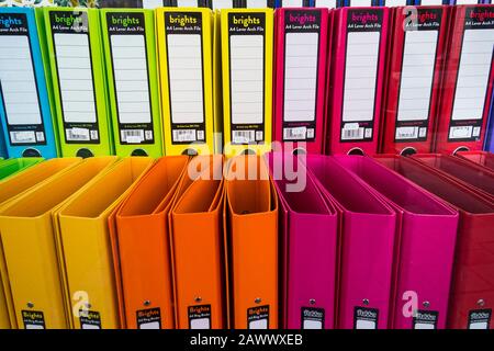 A display of colourful Lever Arch Files and Box Files Stock Photo - Alamy