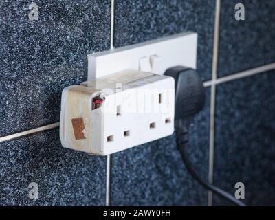 Broken electric socket Stock Photo - Alamy