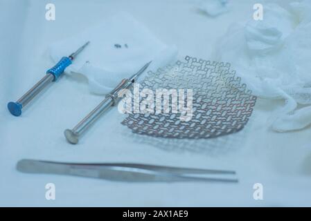 Skull clamp with pins and antiseptic solution for head fixation in ...